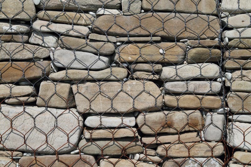 Masonry in the cage. stock photo. Image of wall, material - 15923212