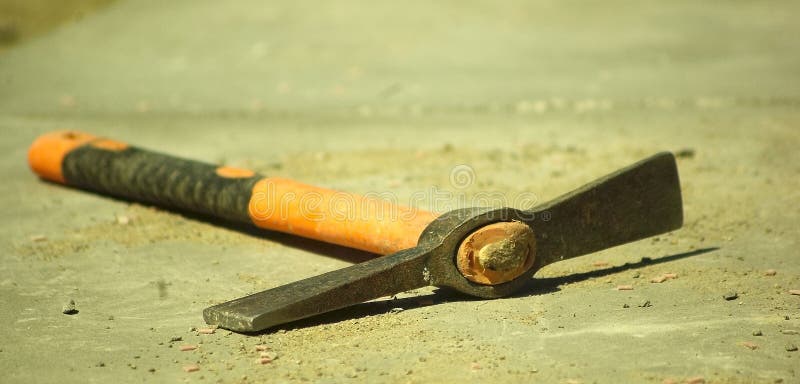 A Bricklayer S Hammer (tiny Pickaxe!?) Lying on a Surface Paved with ...