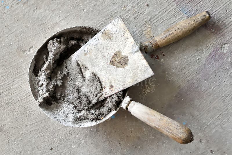 Masonry Tools with Mortar. Gray Concrete Background Stock Photo - Image ...