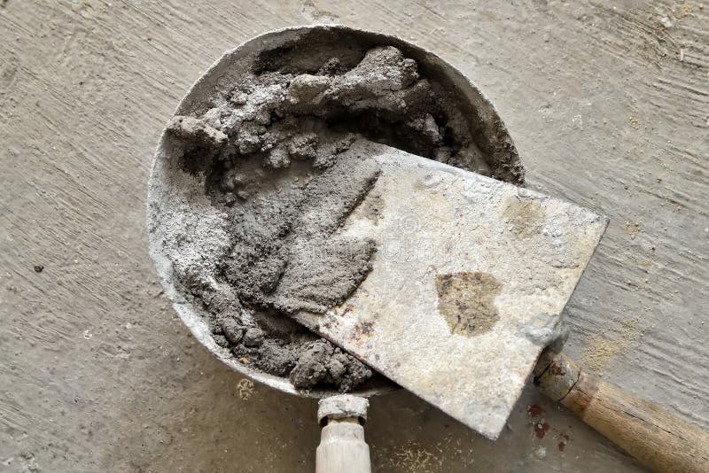 Masonry Tools with Mortar. Gray Concrete Background Stock Photo - Image ...