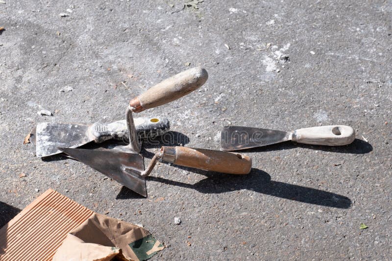Various Masonry and Brickwork Tools Being Used on a Construction Site ...