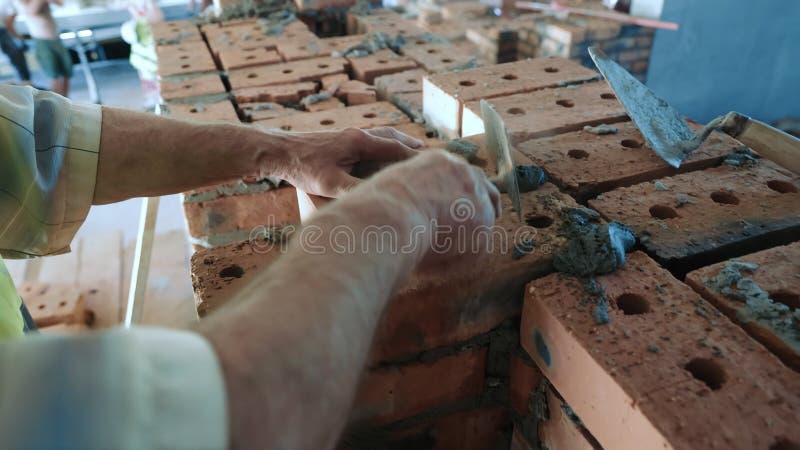 Masonry Work with Bricks and Mortar. a Close-up View of a Bricklaying ...
