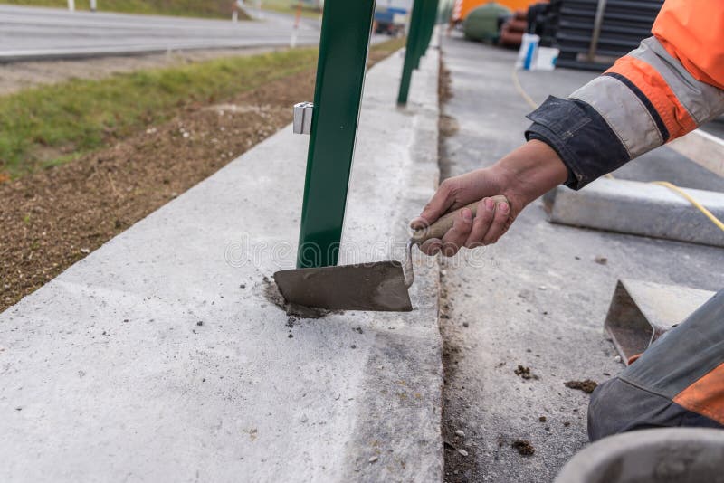 Masonry work with trowel stock image. Image of cement - 109291363