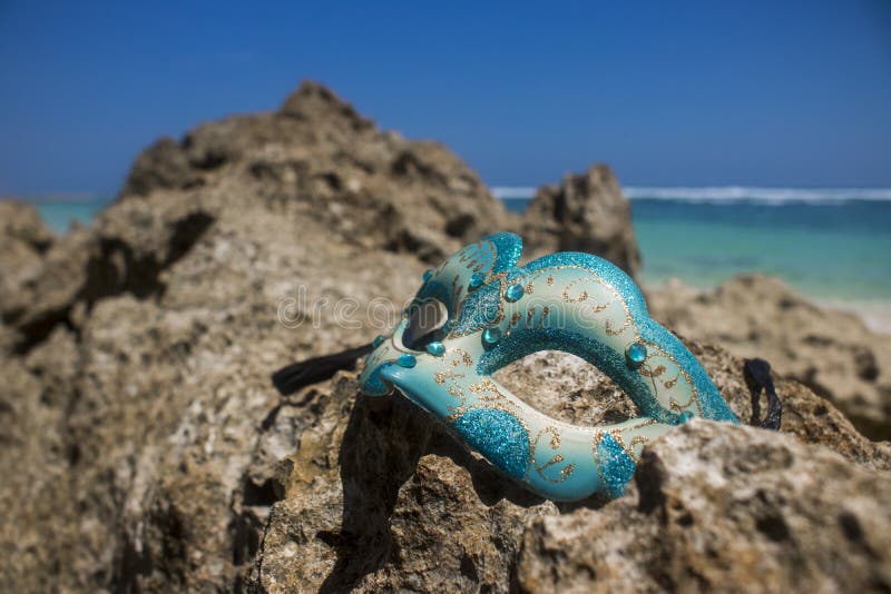 Masquerade Party Mask on Beach View Stock Photo - Image of sand, coral ...