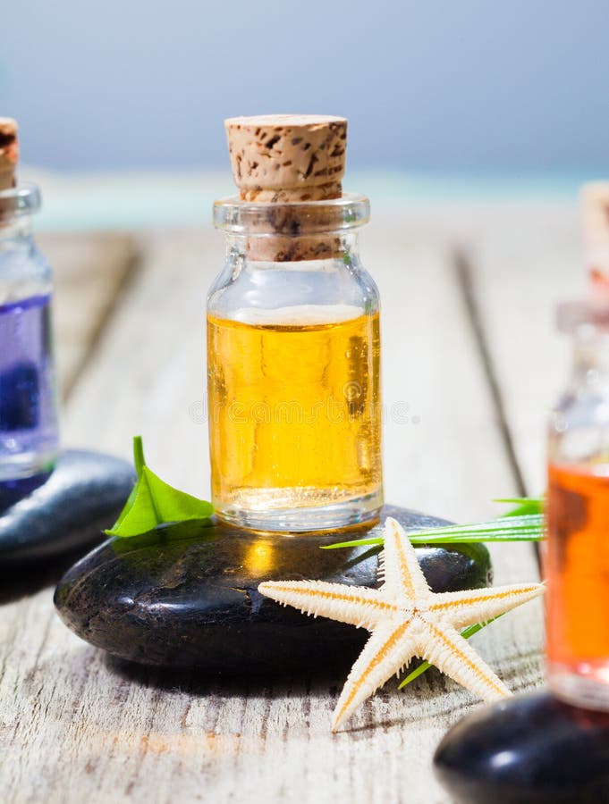 Massage Oils and Stones for Hot Rock Massage Stock Photo - Image of ...