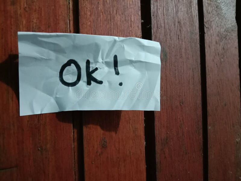 Massage Ok! White Paper Wallpaper on Wood Background Stock Photo ...