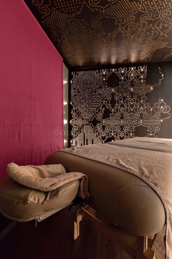Massage Room Interior Design in Wellness and Spa Center. Dim Lighting ...