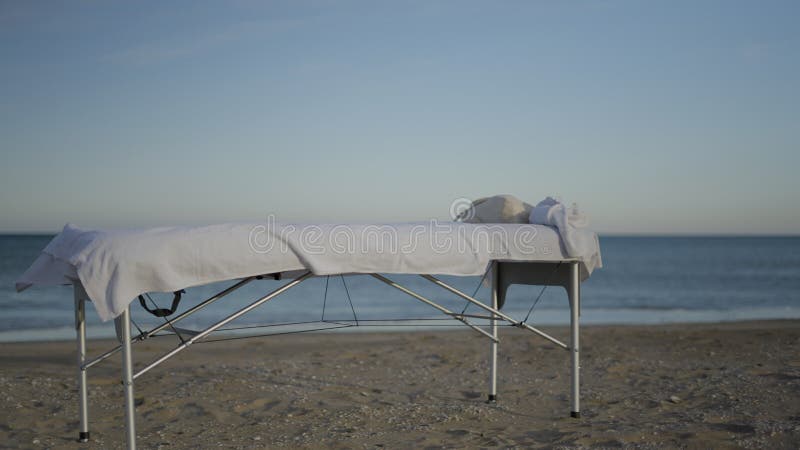 Massage Table at the Beach. Ocean Waves in the Background. No Clouds ...