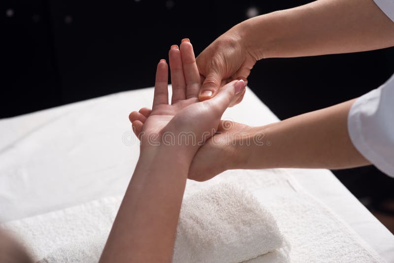 Masseur Doing Hand Massage With Oil In Spa Salon Spa Procedures Body