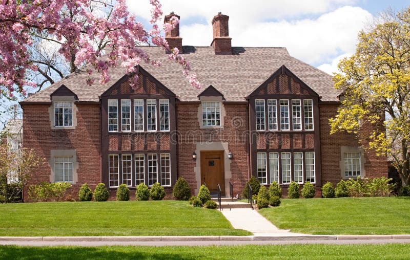 Massive Brick House in Spring Stock Photo - Image of exterior, curb ...