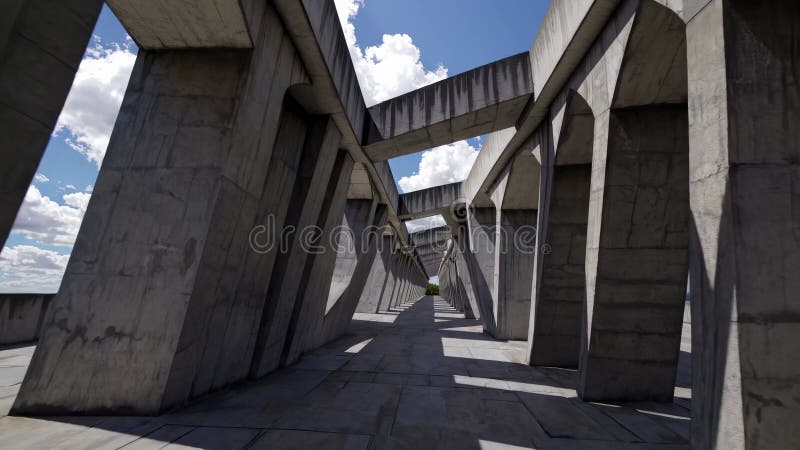 Massive Concrete Structure Displays Bold Geometric Lines and Shadows in ...