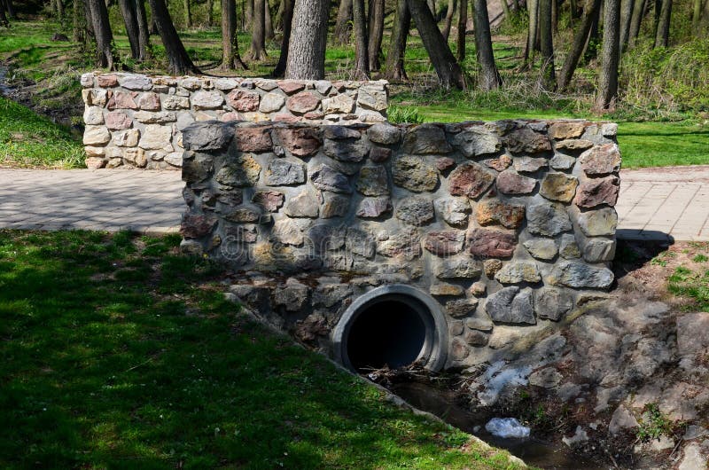 Massive Construction of a Small Bridge Over a Stream Where There is ...