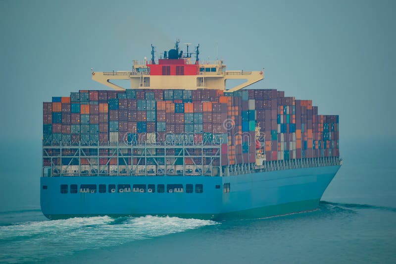 Massive Container Ship Navigating Calm Open Waters with Colorful Cargo ...