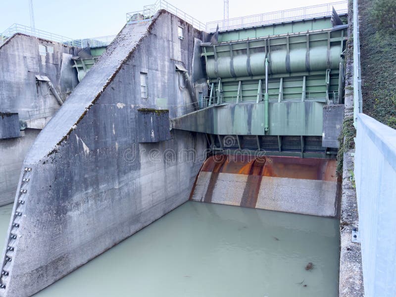 Massive Dam Spillway Structure with Closed Gates and Calm Water Stock ...