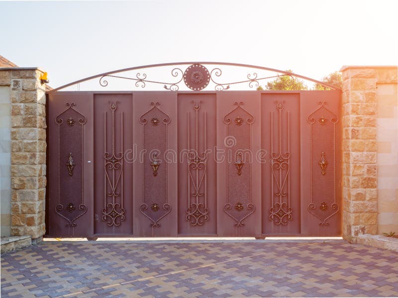 Brown Expensive Gate with Forged Pattern. Massive Fence with Iron Brown ...