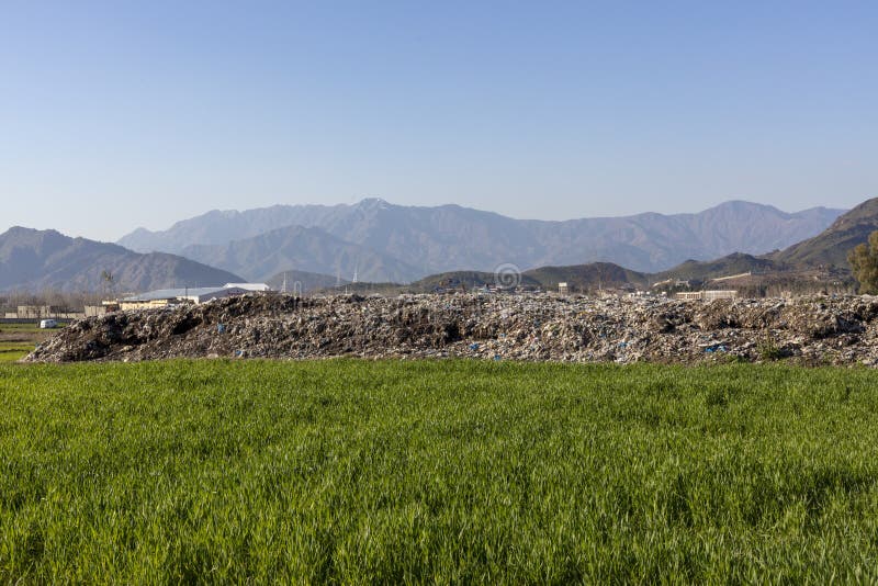 A Massive Garbage Dump Solid Waste Site in Agriculture Fields Stock ...