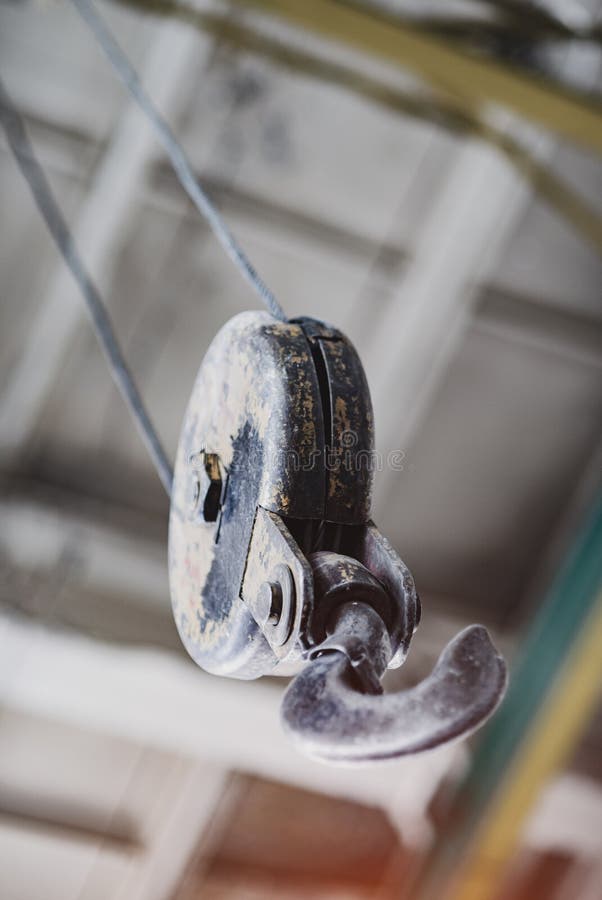 Massive Metal Crane Hook Hanging on a Cable Stock Photo - Image of link ...