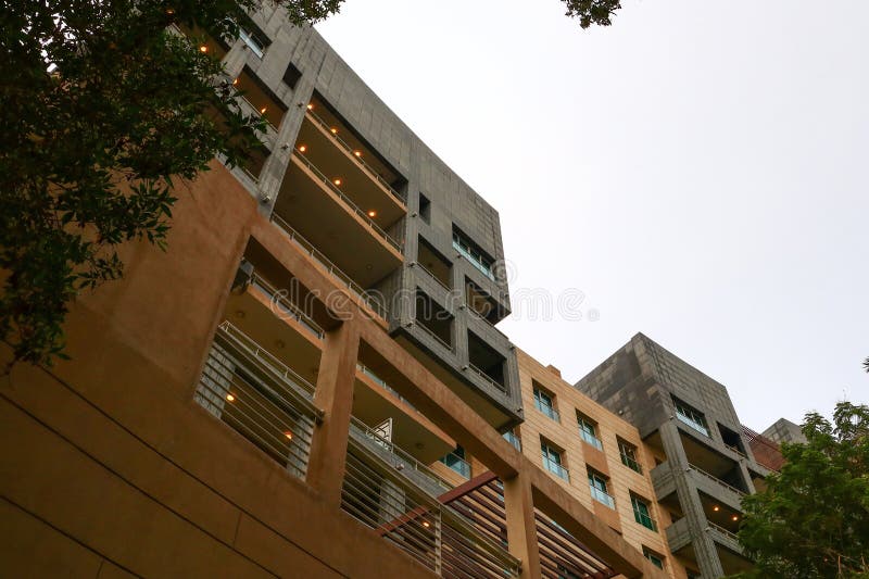 A Massive Multi-storey Building Reaching into the Sky. Stock Photo ...