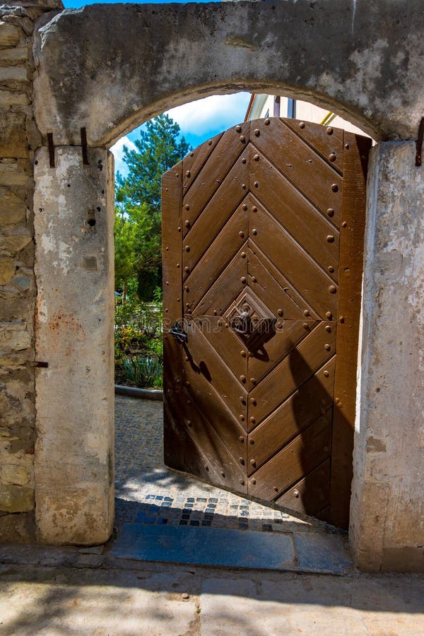 Massive Old Half-open Wooden Doors Stock Image - Image of historic ...