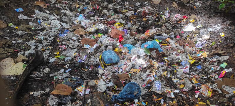 Environmental Impact: a Heap of Trash Polluting the Earth Stock Photo ...