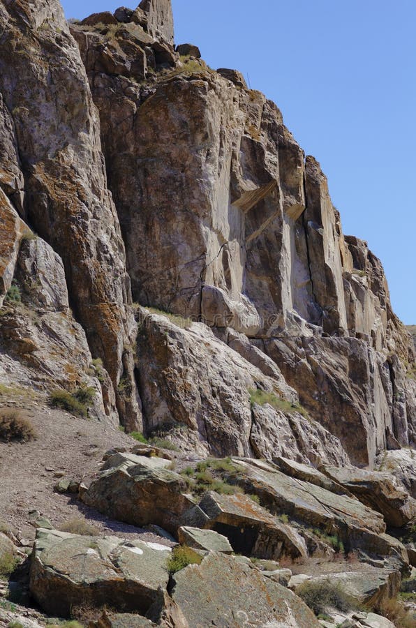 Massive Rock Formation in Dry Mountain Valley Under Clear Deep Blue Sky ...