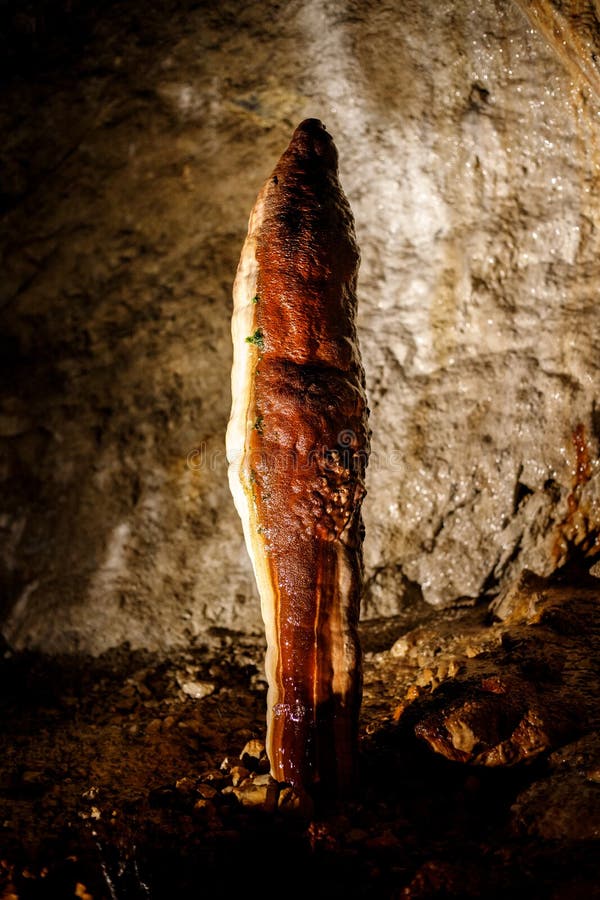 Massive Stalagmite in a Cave Stock Photo - Image of tunnel, underground ...