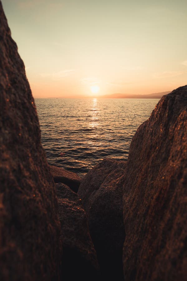 Massive Sunset from the Rocks of the Port Stock Image - Image of ...
