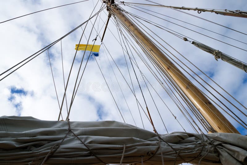 Mast, Ropes and Sails Collected from an Old Sailboat Seen from Below ...