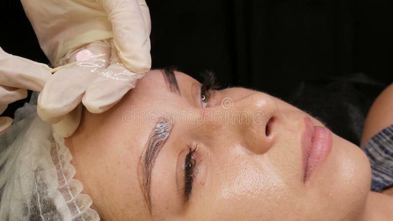 The Master Applies Special Anesthesia before the Procedure. Eyebrow ...