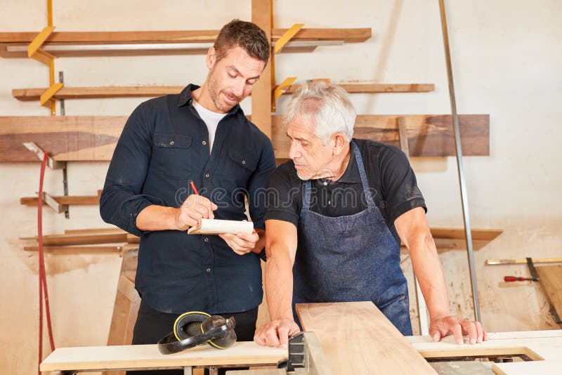 Master and Apprentice Discuss a Mission Stock Photo - Image of ...
