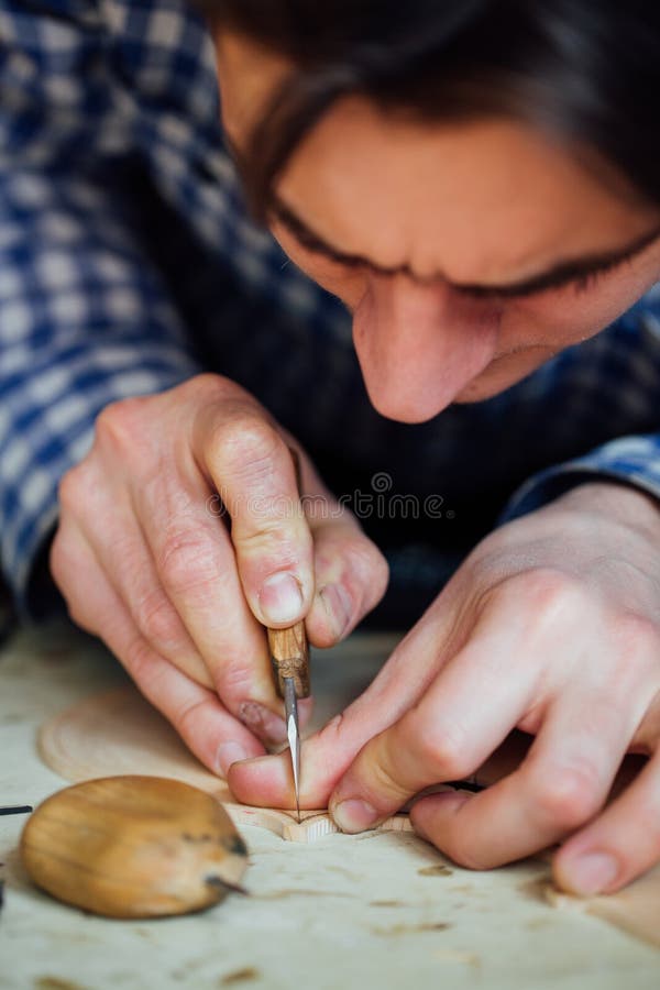 Master Artisan Luthier Working on the Creation of a Violin. Painstaking ...