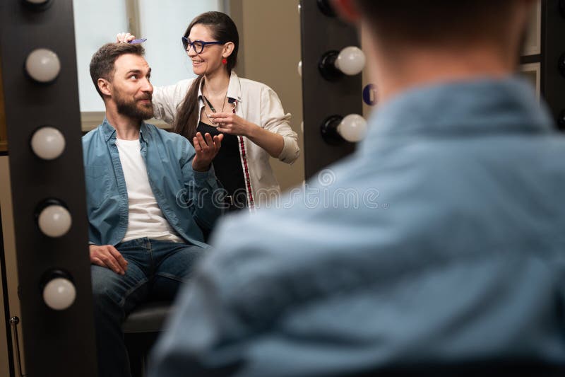 Master Barber at the Workplace Communicates with the Client Stock Photo ...