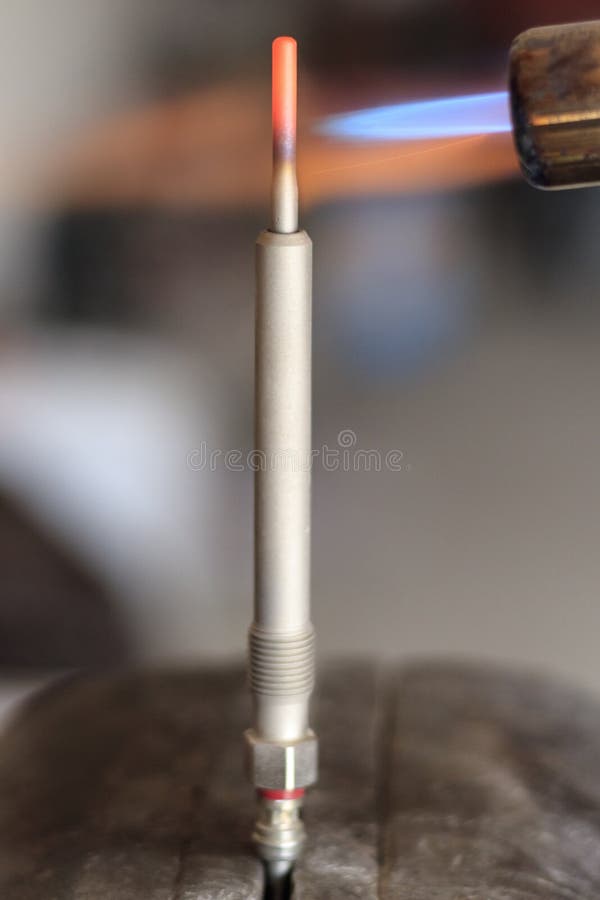 Master in Blue Gloves Check the Candle. Engine Compartment in the Car ...