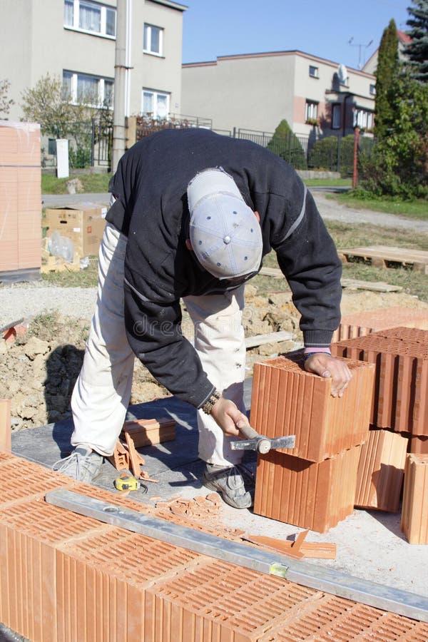 Bricklayer at work stock photo. Image of cement, construction - 5464780
