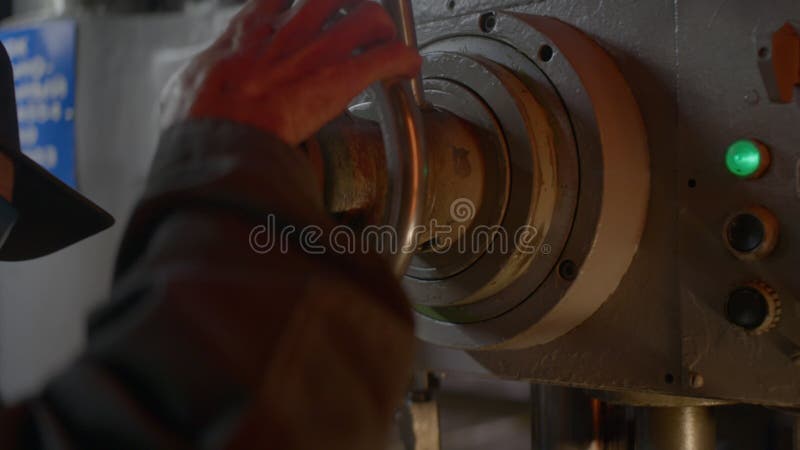 Master Carefully Presses Button on Control Panel of Lathe in Workshop ...