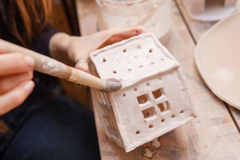 A Master Ceramist Holds a Clay Product in His Hands. Making a Ceramic ...