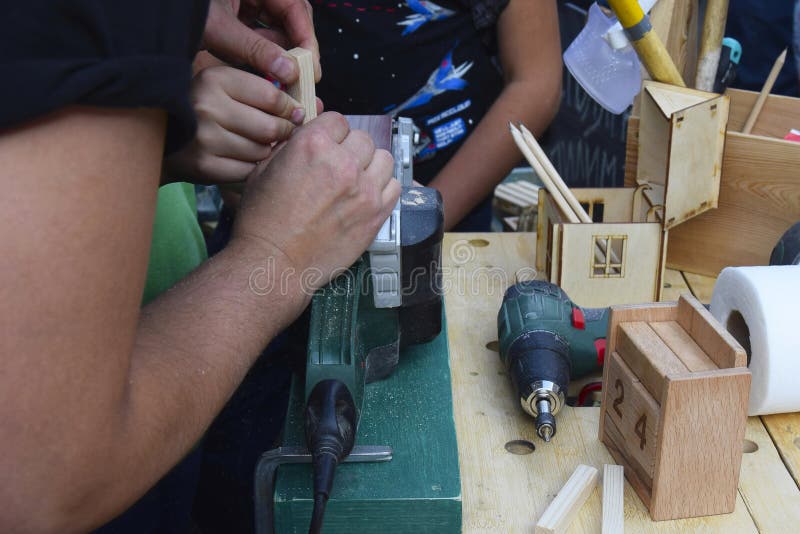 Master Class in Carpentry Training. Tools and Carpenter`s Hands Stock ...