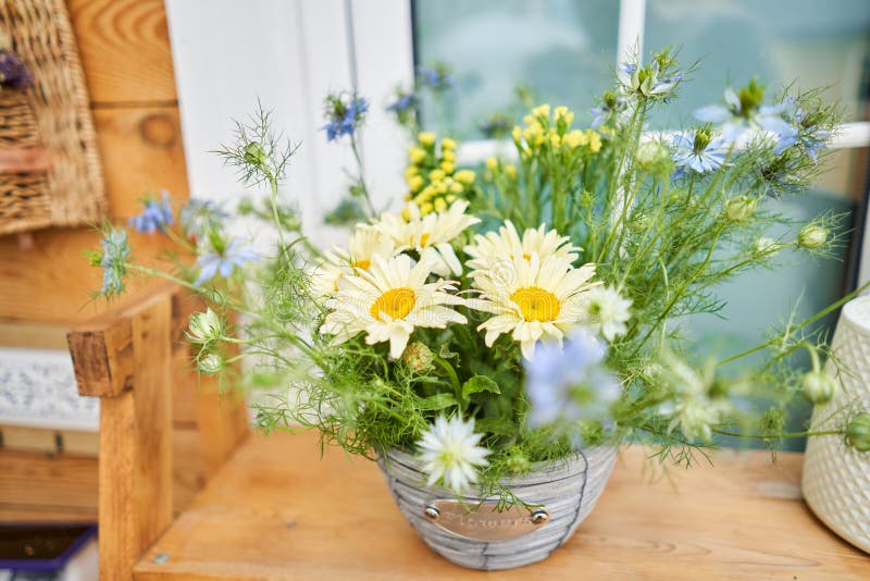 Master Class on Making Bouquets. Spring Bouquet in Wicker Basket Stock ...