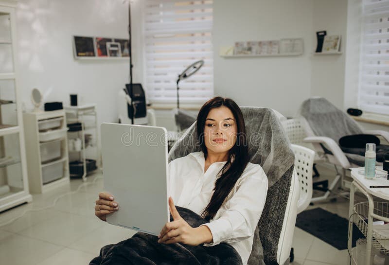 Master and Client Looking at the Mirror after Finishing of Permanent ...