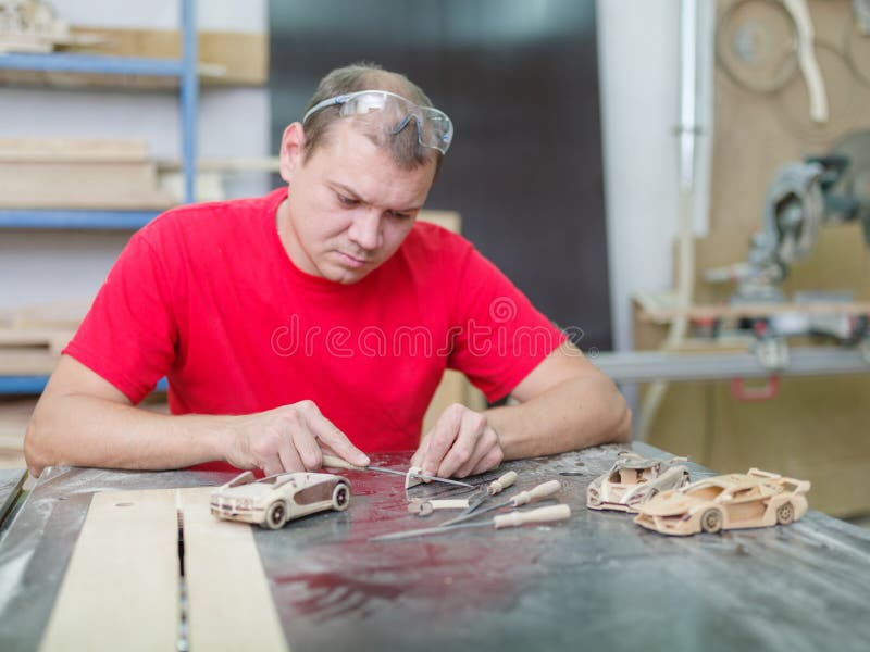 The Master Collects a Wooden Model of the Car Stock Image - Image of ...