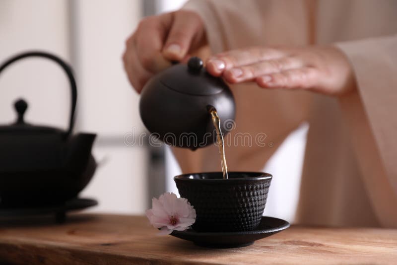 Master Conducting Traditional Tea Ceremony at Table, Closeup Stock ...