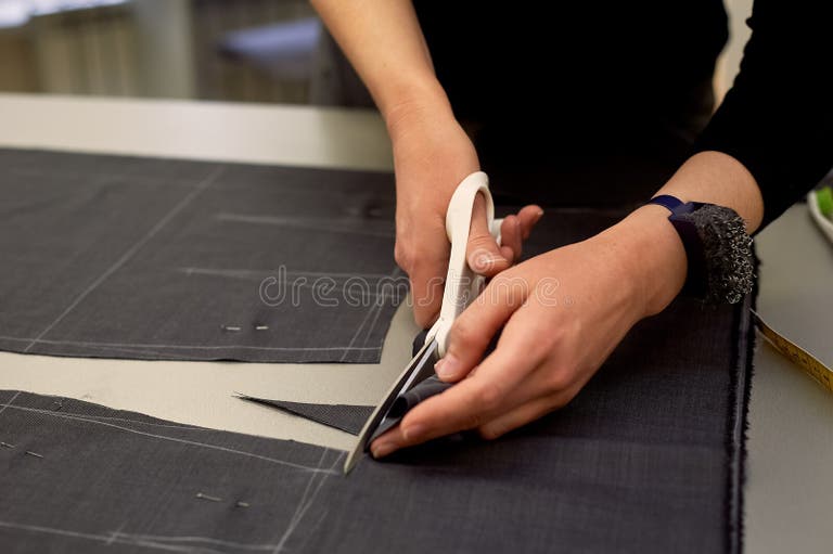 Master Cuts Fabric. Nesting. Suiting Fabric Marked with White Chalk ...