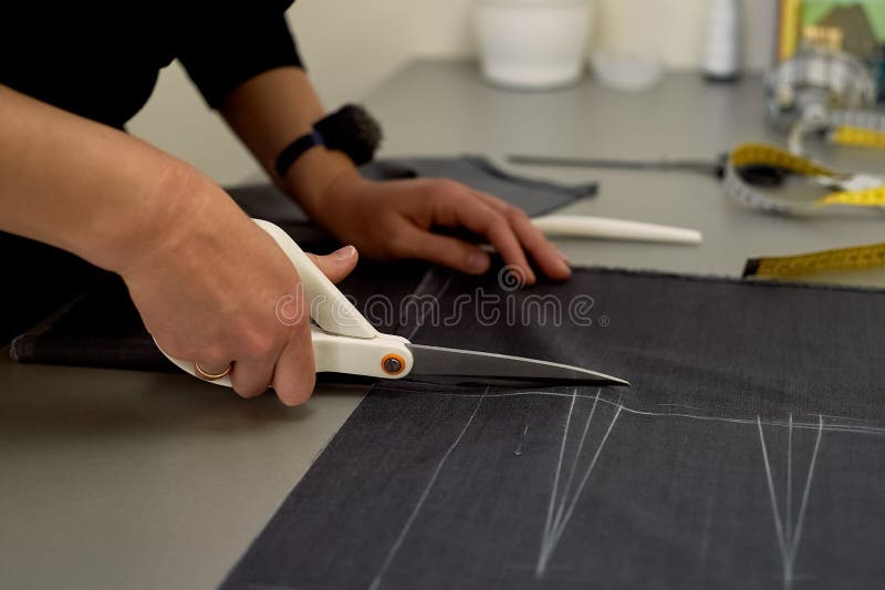Master Cuts Fabric. Nesting. Suiting Fabric Marked with White Chalk ...