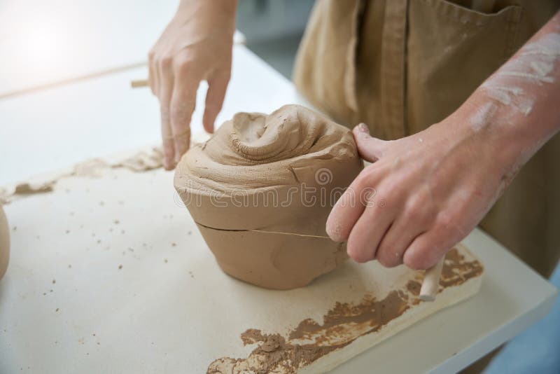 Master Cuts a Piece of Clay with a Metal String Stock Photo - Image of ...