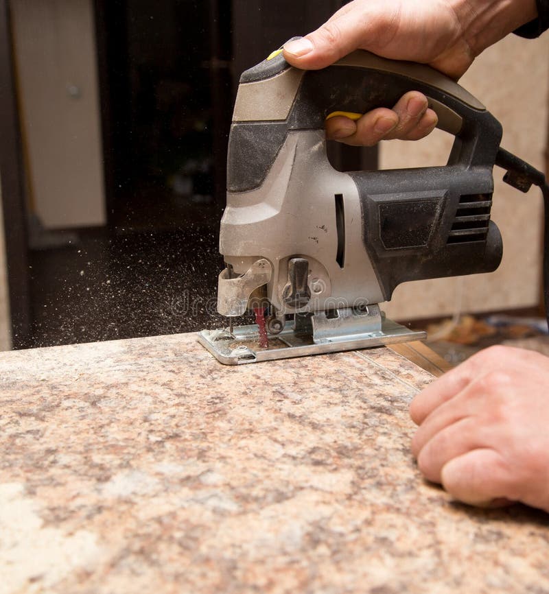 Master Cuts Wood with a Jig Saw Stock Image - Image of master, cutting ...