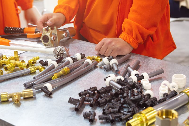 Master Demonstrates Components for Installation of Cross-linked ...