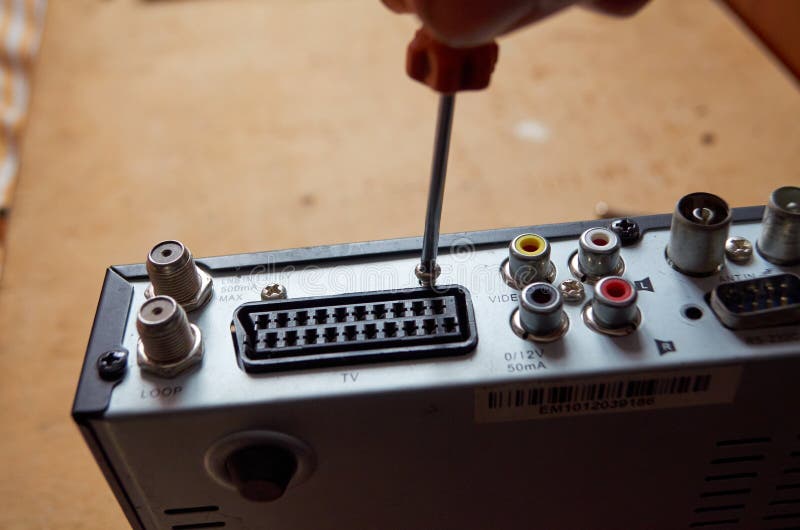 Master Disassembles the Satellite Tuner Stock Photo - Image of ...