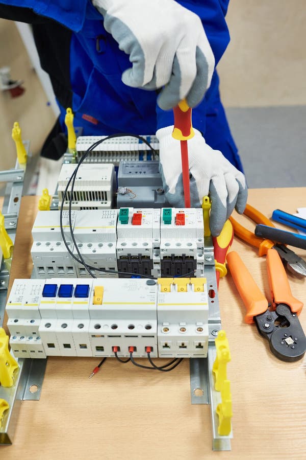 Master Electrician Collects Electrical Diagram Stock Photo - Image of ...