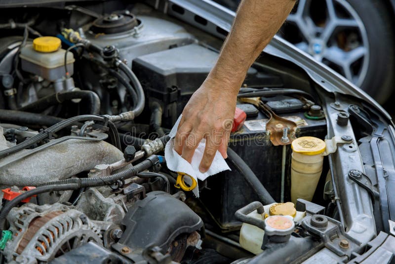 Master is Engaged in Maintenance of an Engine Car at a Workshop Stock ...