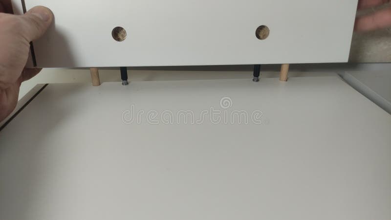 Master Furniture Maker Assembles Furniture by Joining Furniture Boards ...